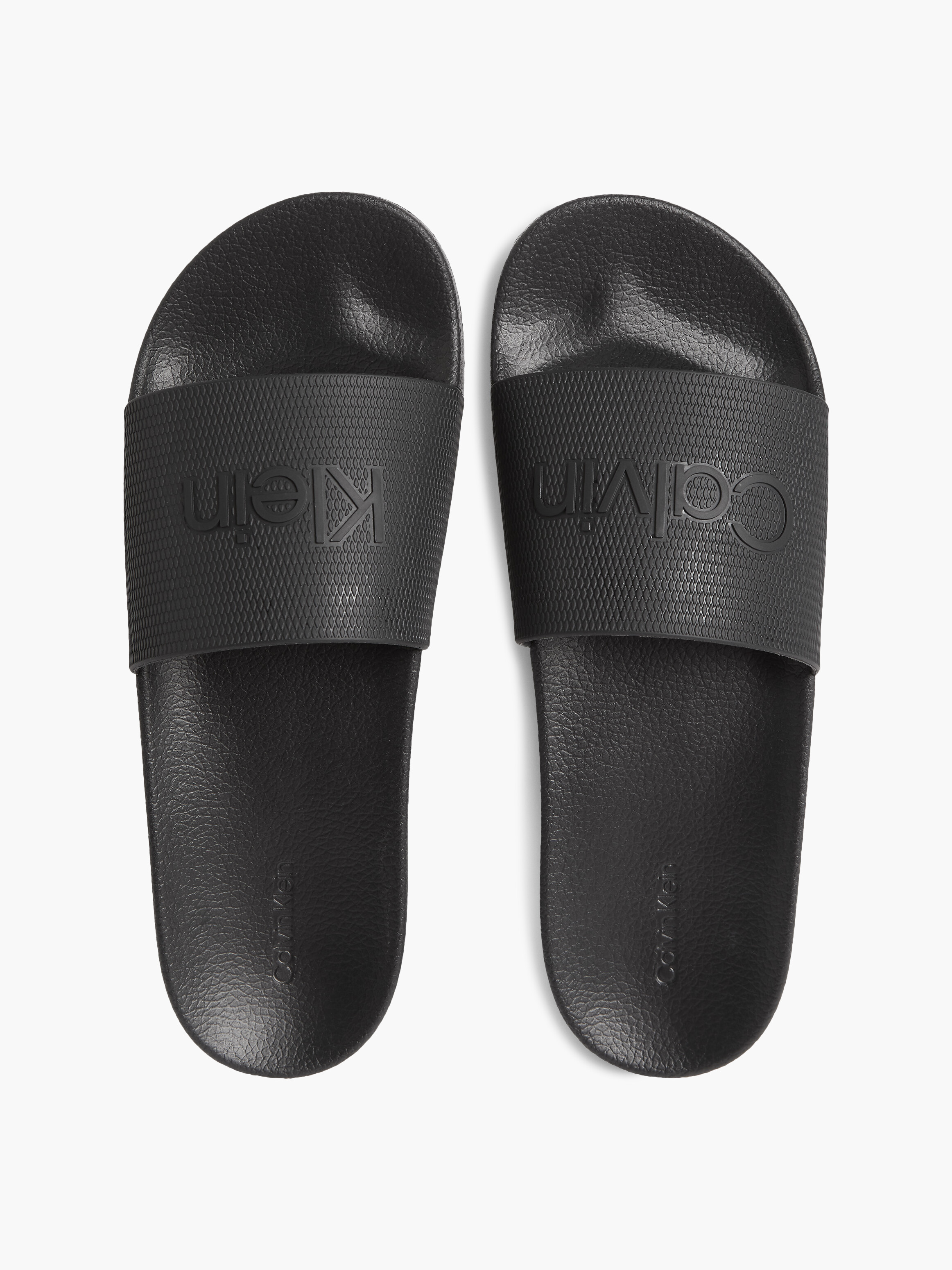 women's black calvin klein sliders